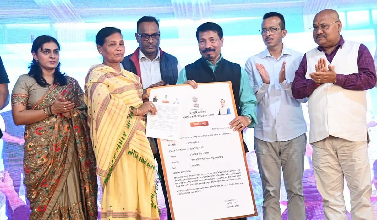 Minister Atul Bora distributes approval letters under PMAY-G