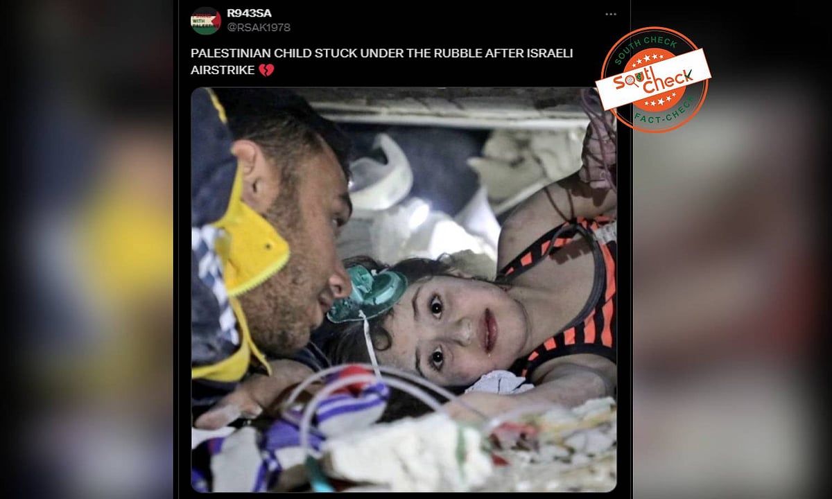 Fact Check: Viral image of child stuck under rubble is from Turkey, not ...