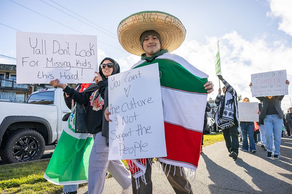 Hundreds Brave Cold at Alki Beach to Protest ICE and Trump's ...