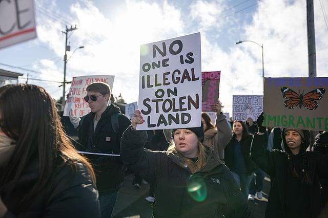 Hundreds Brave Cold at Alki Beach to Protest ICE and Trump's ...