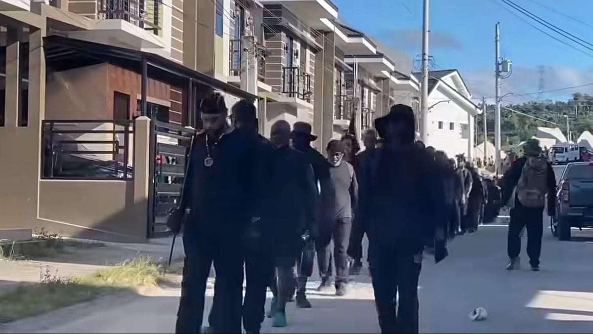 Foreigners marching inside subdivision a religious group