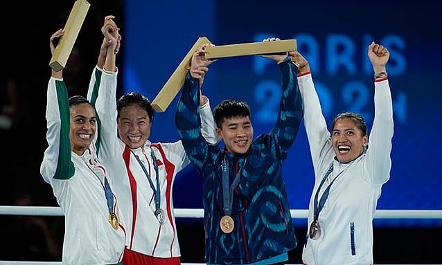 Boxer Imane Khelif wins gold to cap an Olympics marked by scrutiny over ...