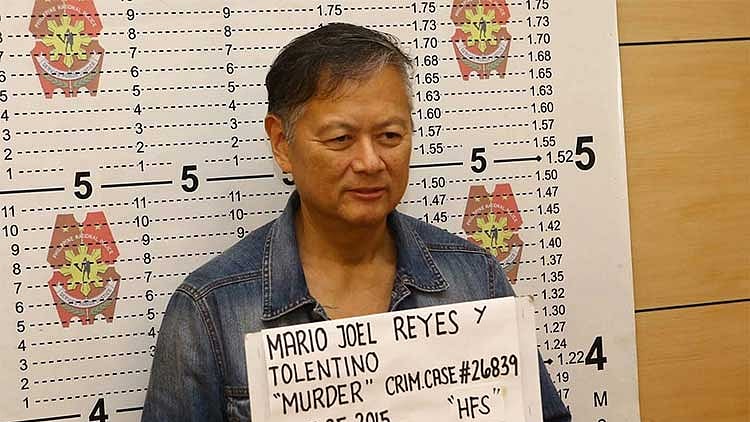 Ex-Palawan guv Joel Reyes surrenders