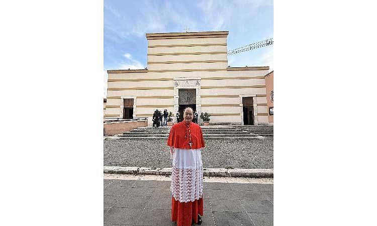 Cardinal Ambo installed in titular church in Rome