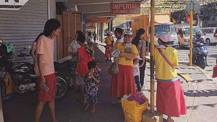 Dress code spurs clothing rentals outside Basilica