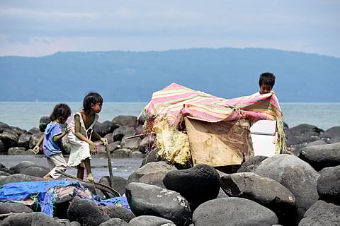 Children playing 'bahay-bahayan'
