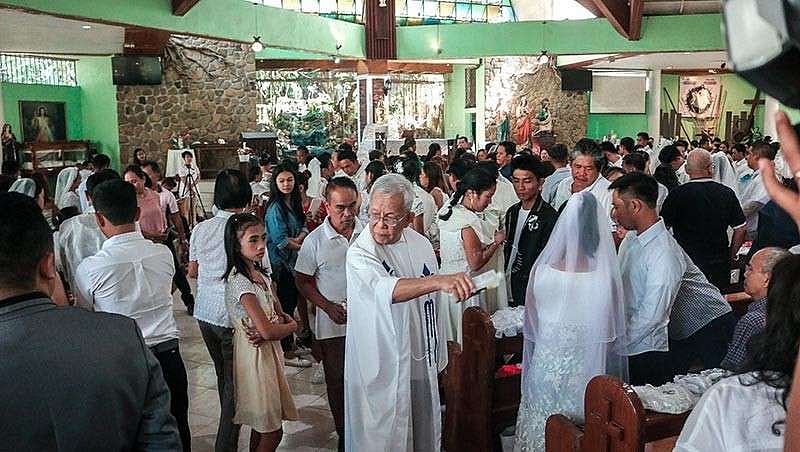 75 couples tie the knot in Oro mass wedding