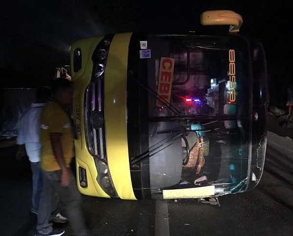 Bus turns on its side in Carcar City; 4 hurt