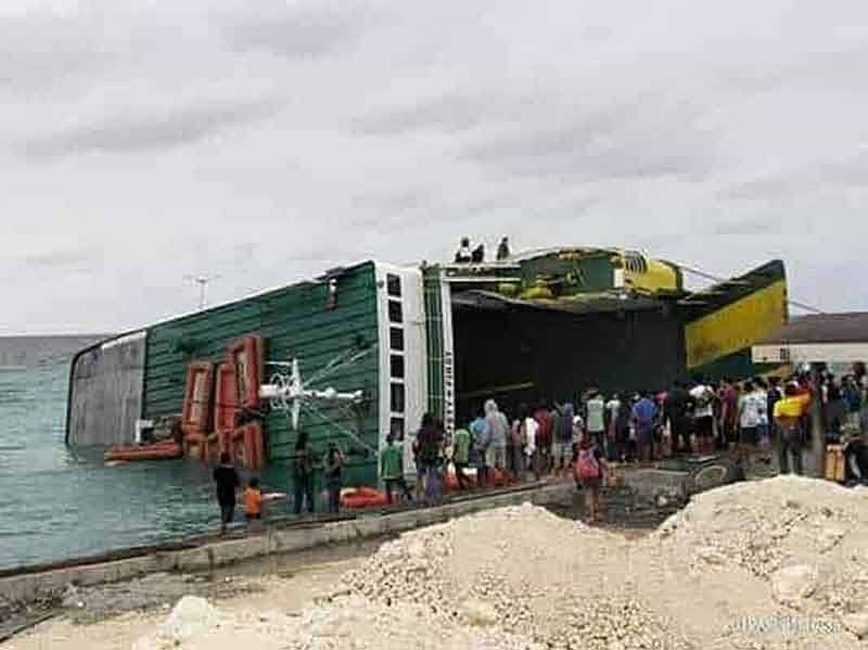 Roro vessel falls on its side while unloading cargo