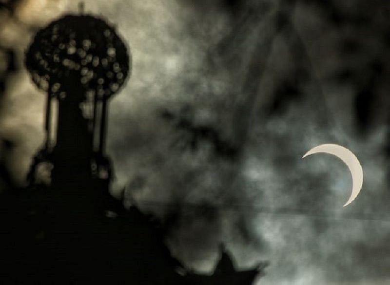 IN PHOTOS: Last solar eclipse of the decade