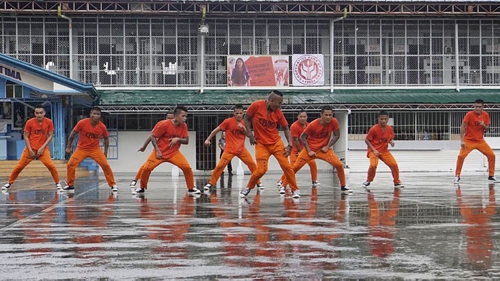 Dancing inmates back