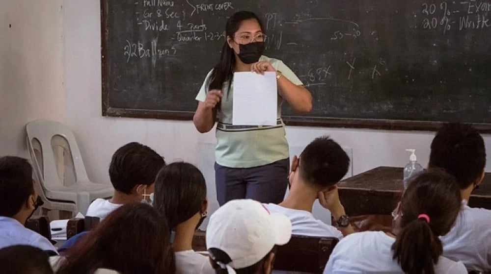 DepEd allows paid leaves for teachers in isolation, voluntary wearing ...