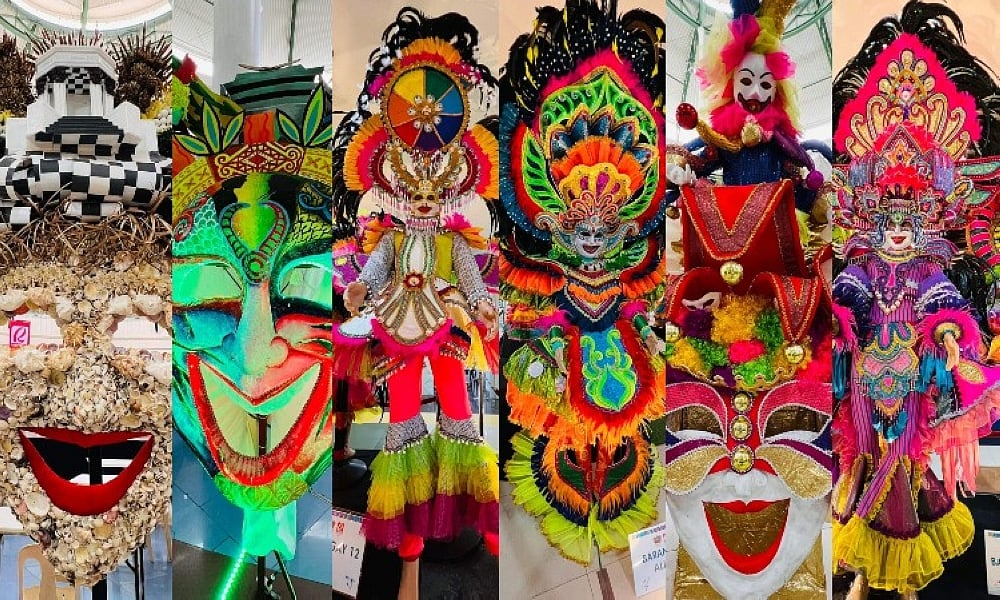 Take a glance at the MassKara festival giant masks and full costumes