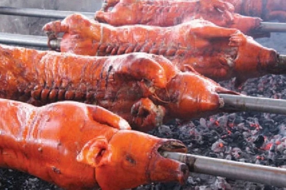 COA flags Liloan for 'irregular' spending on lechon in 2022