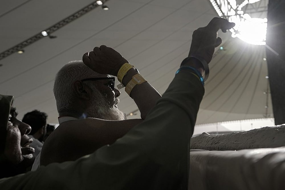 Muslims at Hajj brave intense heat to cast stones at pillars ...