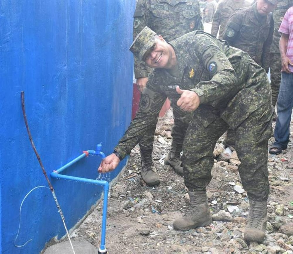 Westmincom installs rainwater tanks in island village
