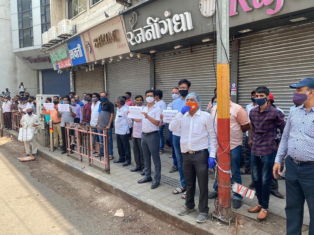 Pune lockdown: Forced to shut shops, traders protest against strict ...