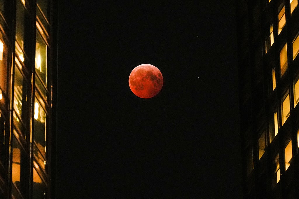 A total lunar eclipse will turn the moon blood red on Tuesday across ...