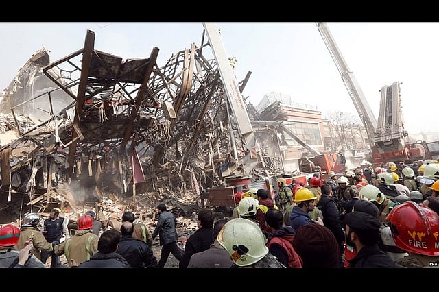 At least 30 fire fighters killed as Tehran's oldest trade tower ...