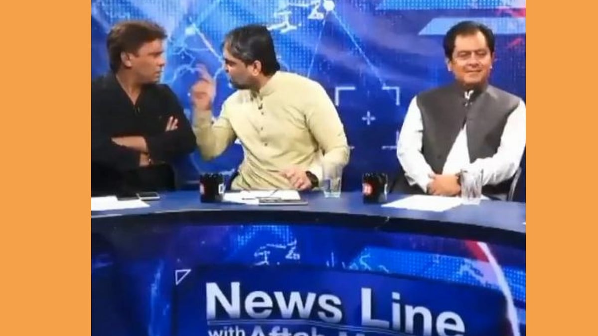 Pakistan leader pushes and punches journalist on live TV