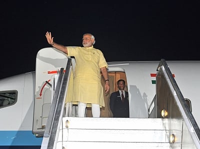 'Howdy Houston!' says PM as he arrives to packed itinerary