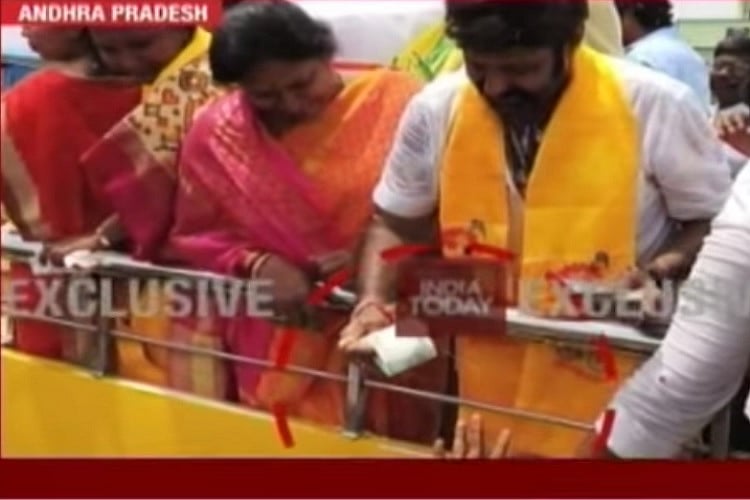 Andhra MLA Balakrishna caught on camera allegedly giving cash to voters ...