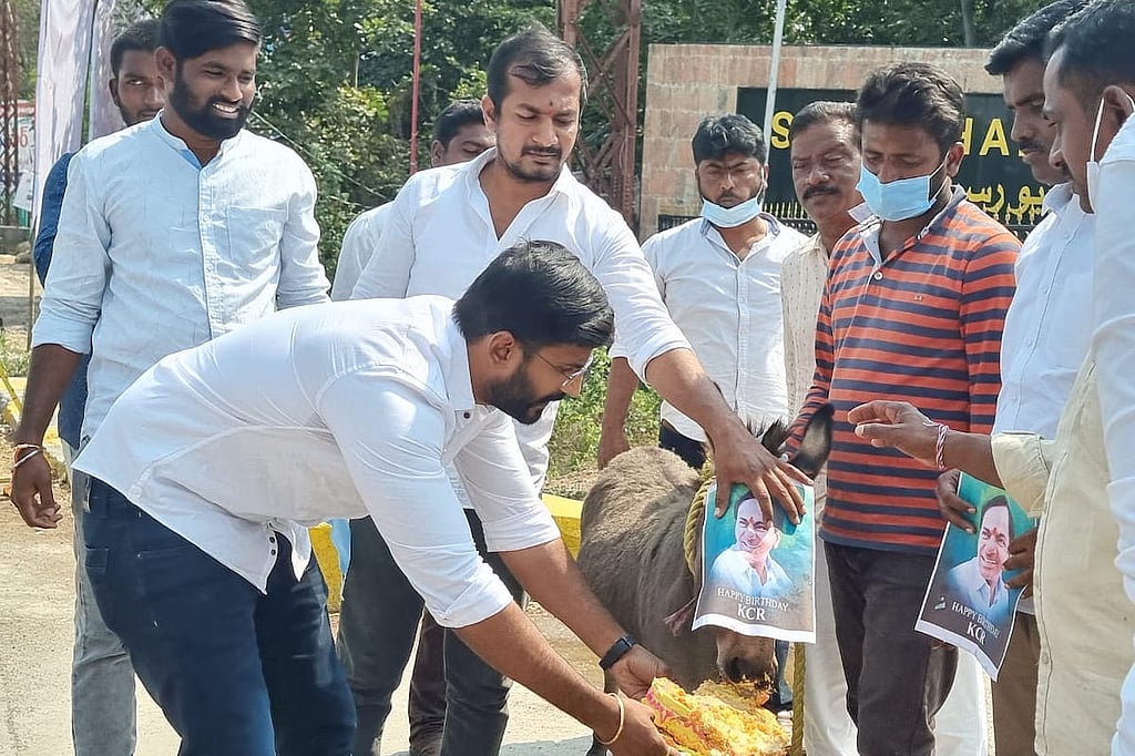 Congress leader uses donkey to protest against KCR, arrested for ...