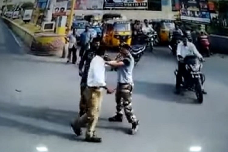 Video: Three policeman in Andhra's Kurnool exchange blows on the road ...