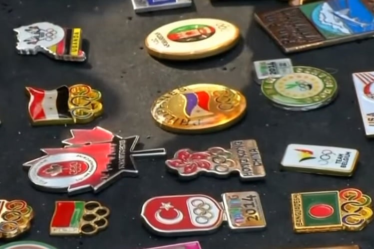 Olympic exotica: Pin collectors add colour and informal social exchange ...