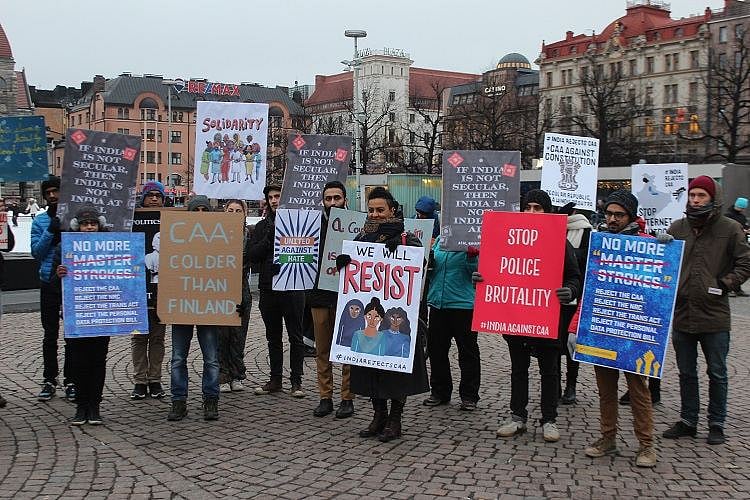 Indians in Finland raise slogans, read Preamble at anti-CAA protest in ...