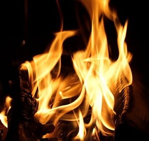 Woman sets herself, four children on fire