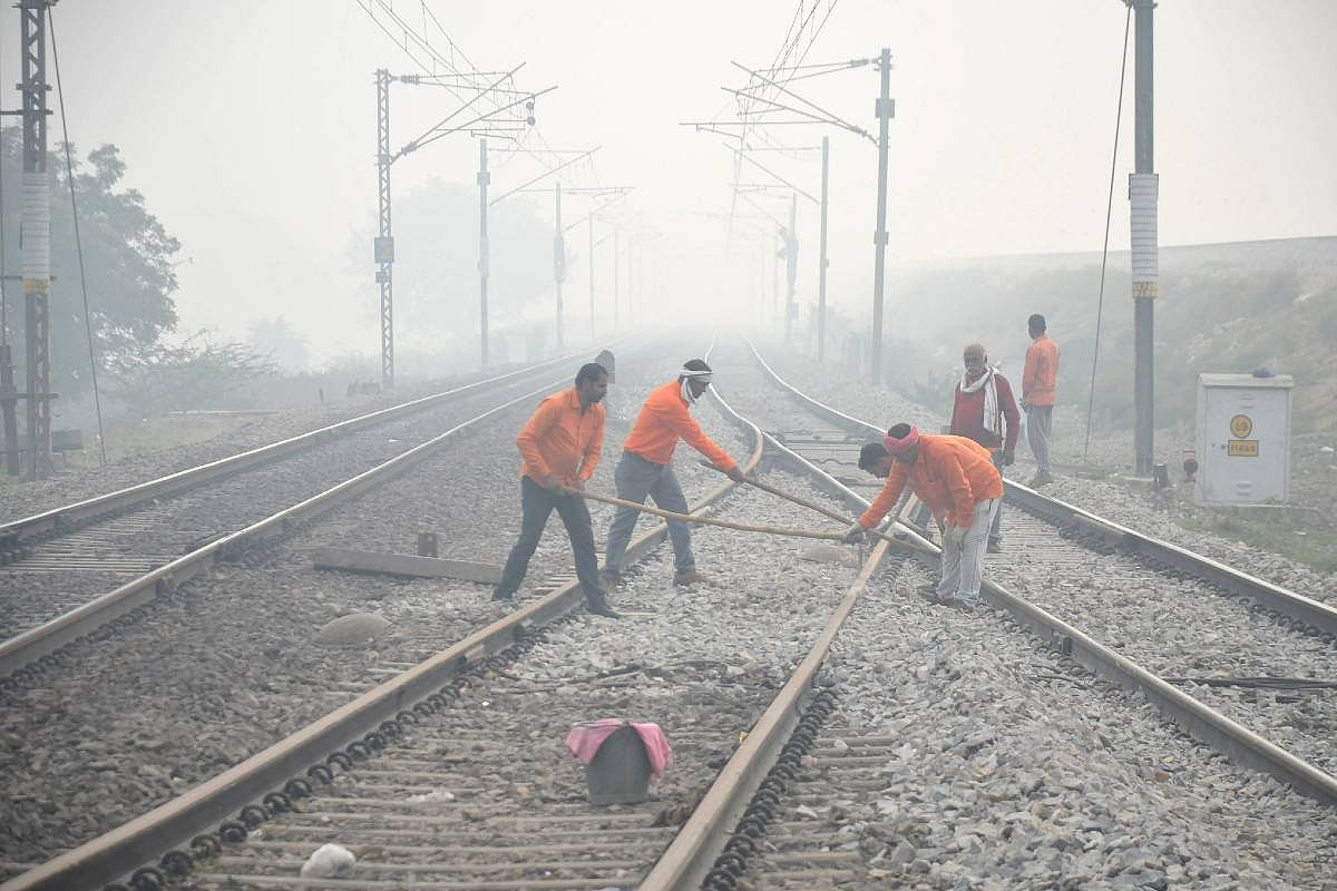 Three railway workers crushed under train while working on track in ...