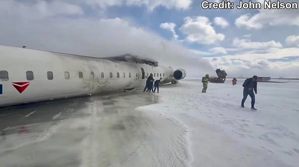 Delta plane flips upside down in Toronto crash, 8 wounded