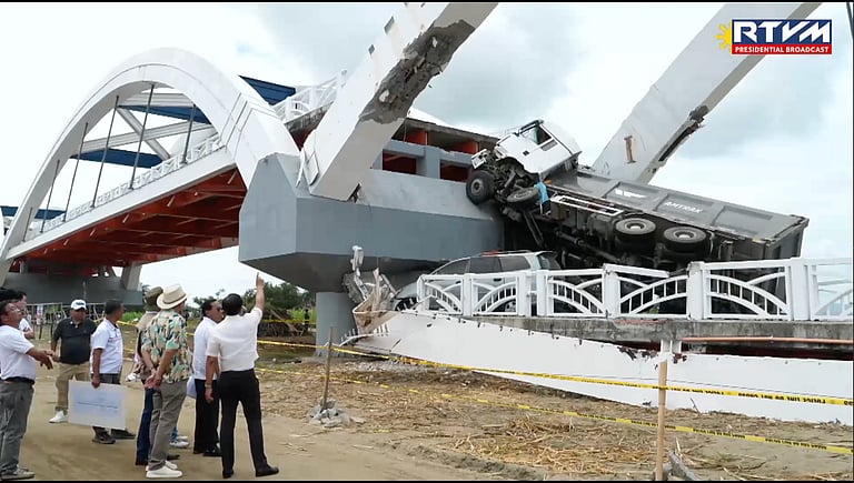 Marcos Inspects Collapsed Cabagan-Sta. Maria Bridge, Cites Design Flaw
