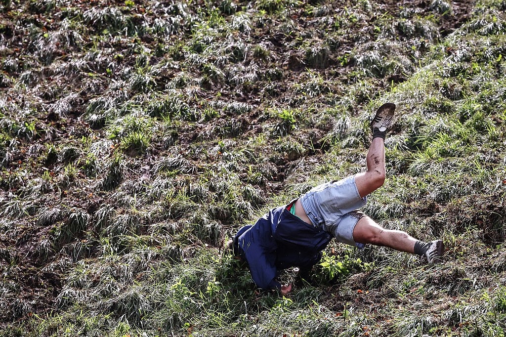 What drives people to chase cheese down a hill? Welcome to Cooper’s Hill