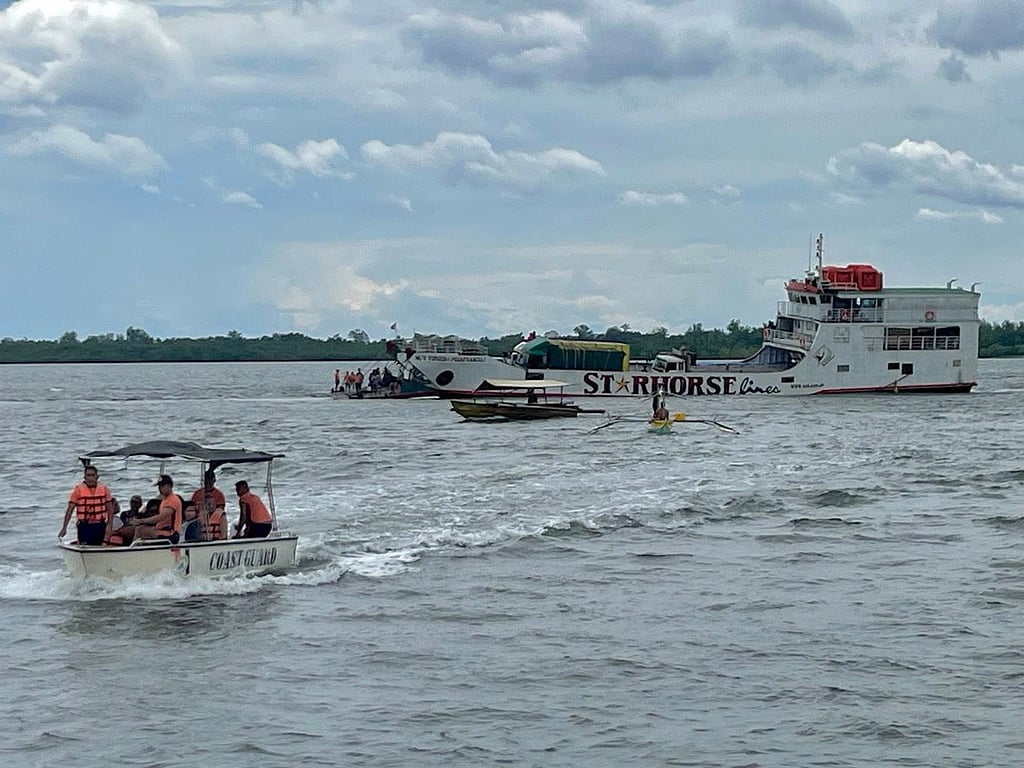 PCG rescues passengers after vessel runs aground near Port of Real