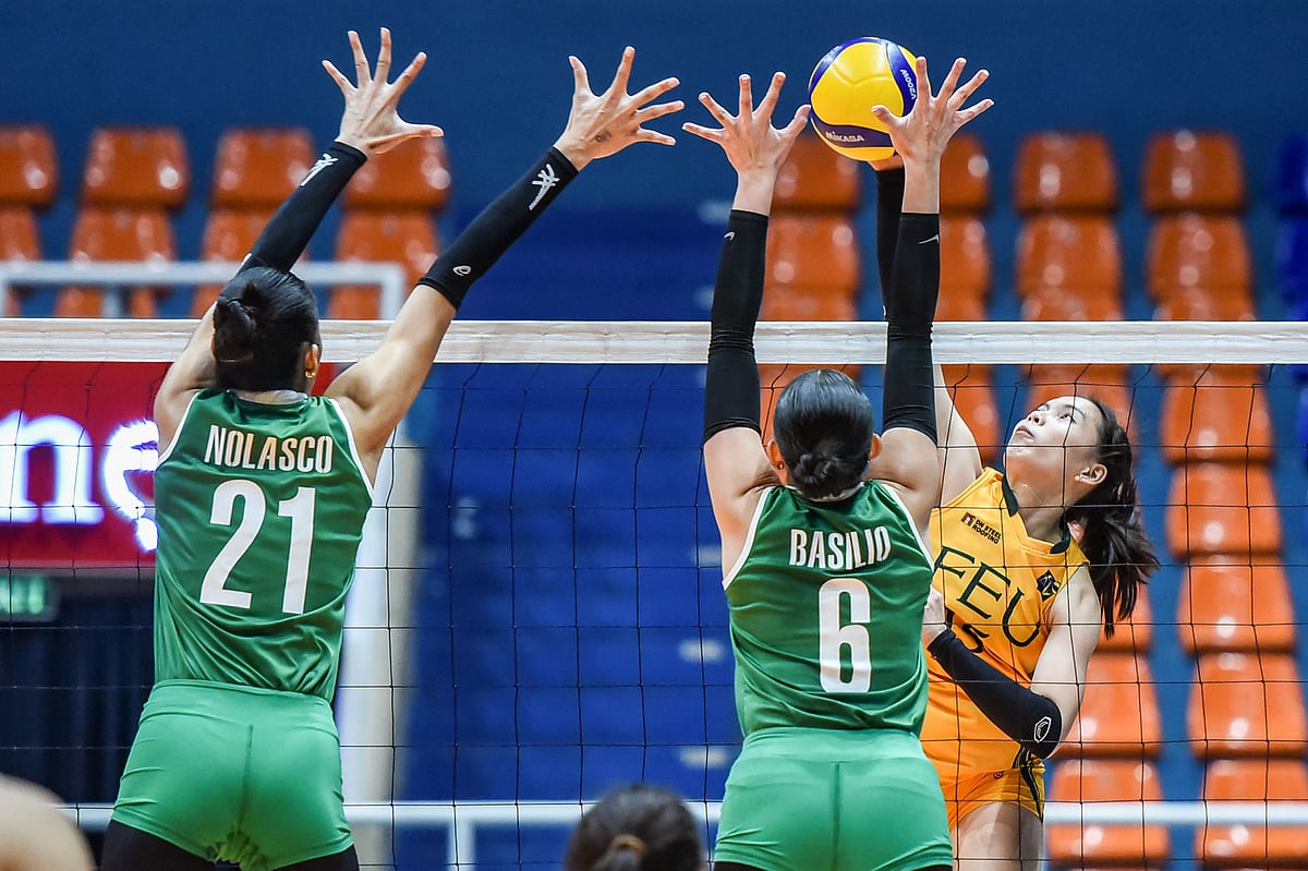FEU holds off CSB, nears finals return