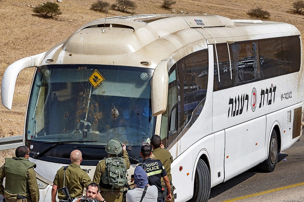 Gun attack on school bus in West Bank wounds 3: army