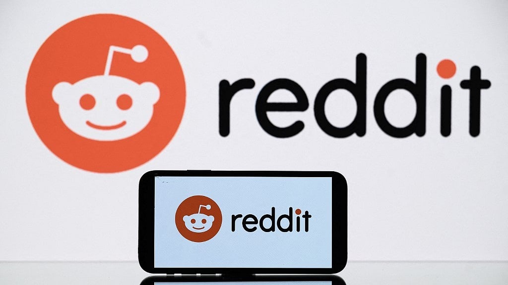 Social media company Reddit rides high in IPO
