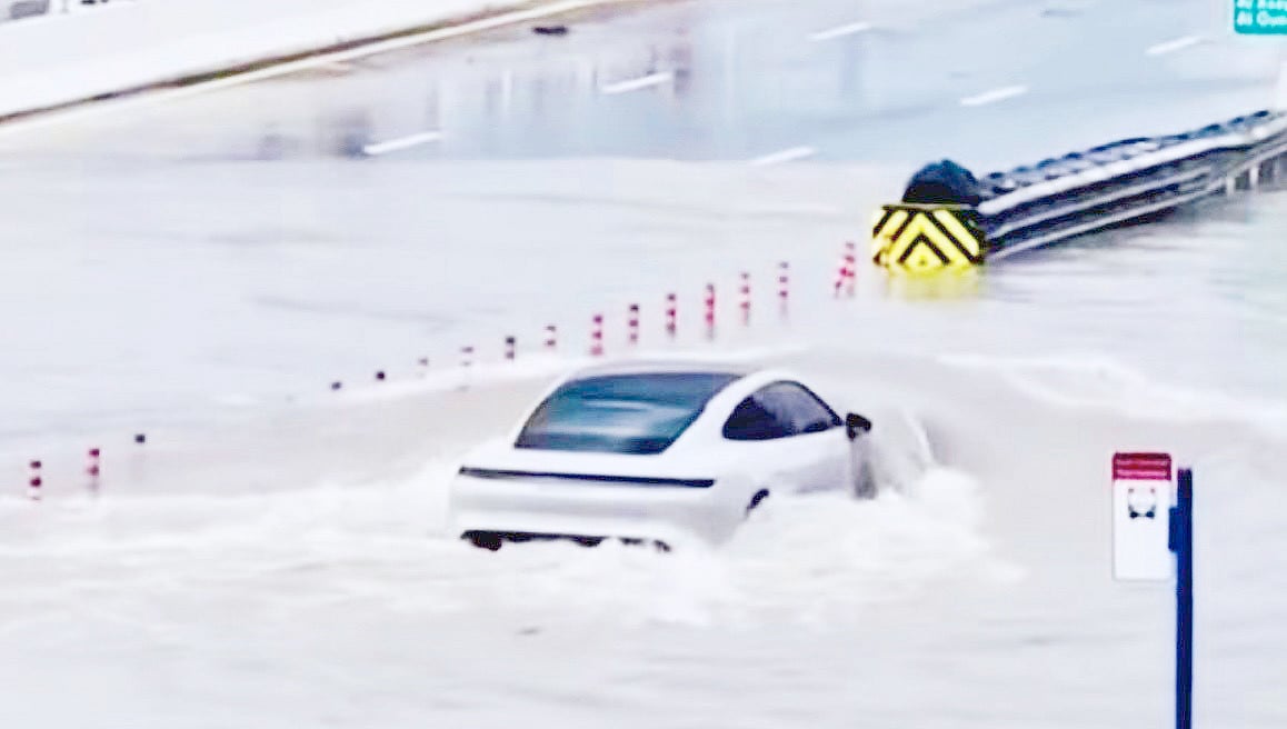 Porsche Taycan braves the flooded streets of Dubai