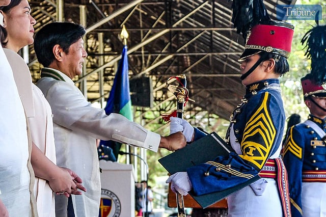 7TH WOMAN TO TOP PMA RECEIVES PRESIDENTIAL SABER
