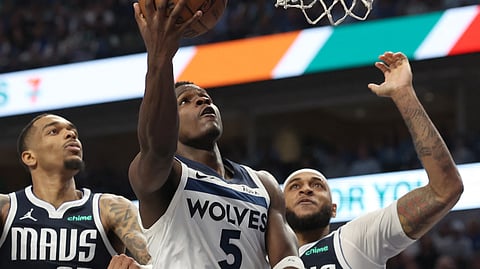 Edwards, Towns keep Wolves alive