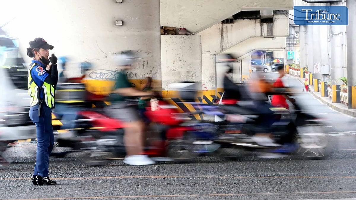 Single mother MMDA traffic enforcer on duty