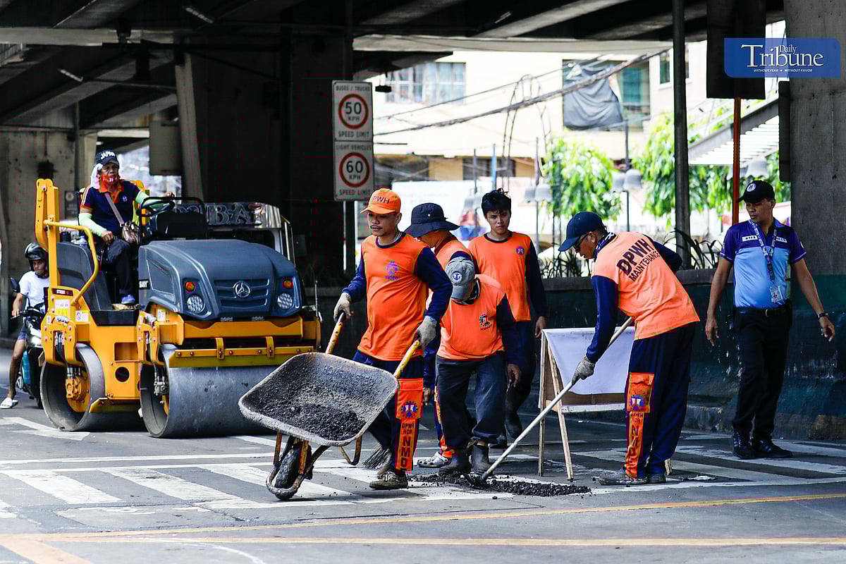 DPWH conducts road works along Tayuman