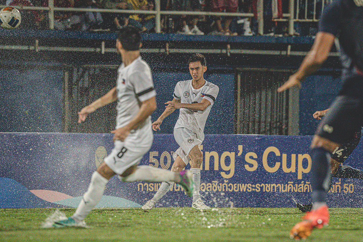 Filipino booters succumb to Thais, pouring rain