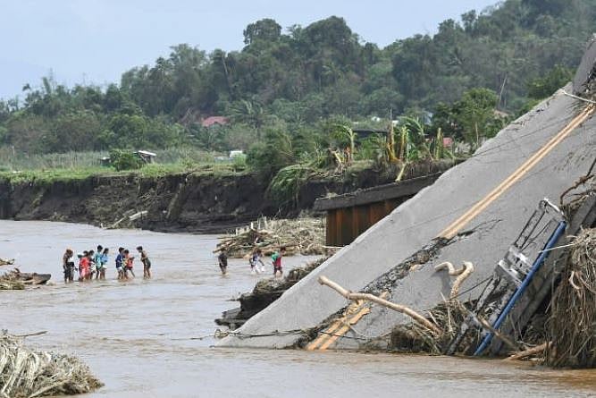 Rescuers Navigate Floodwaters to Reach Flooded Communities
