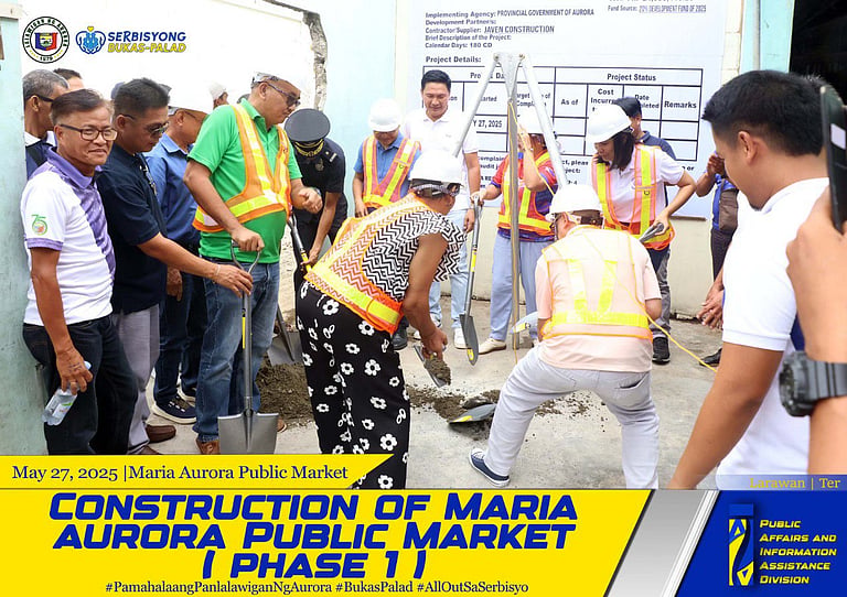 Maria Aurora constructing new market building