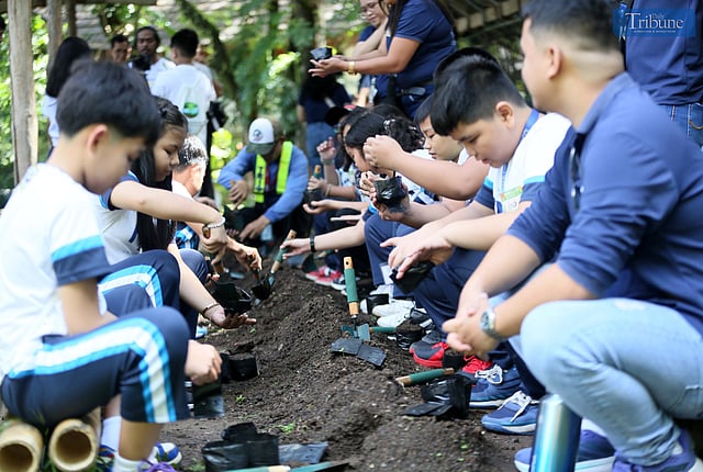 Future earth advocates: Students learn tree-planting on Arbor Day