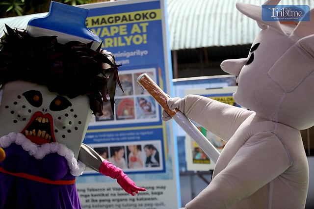 Mascot dressed as a cancer