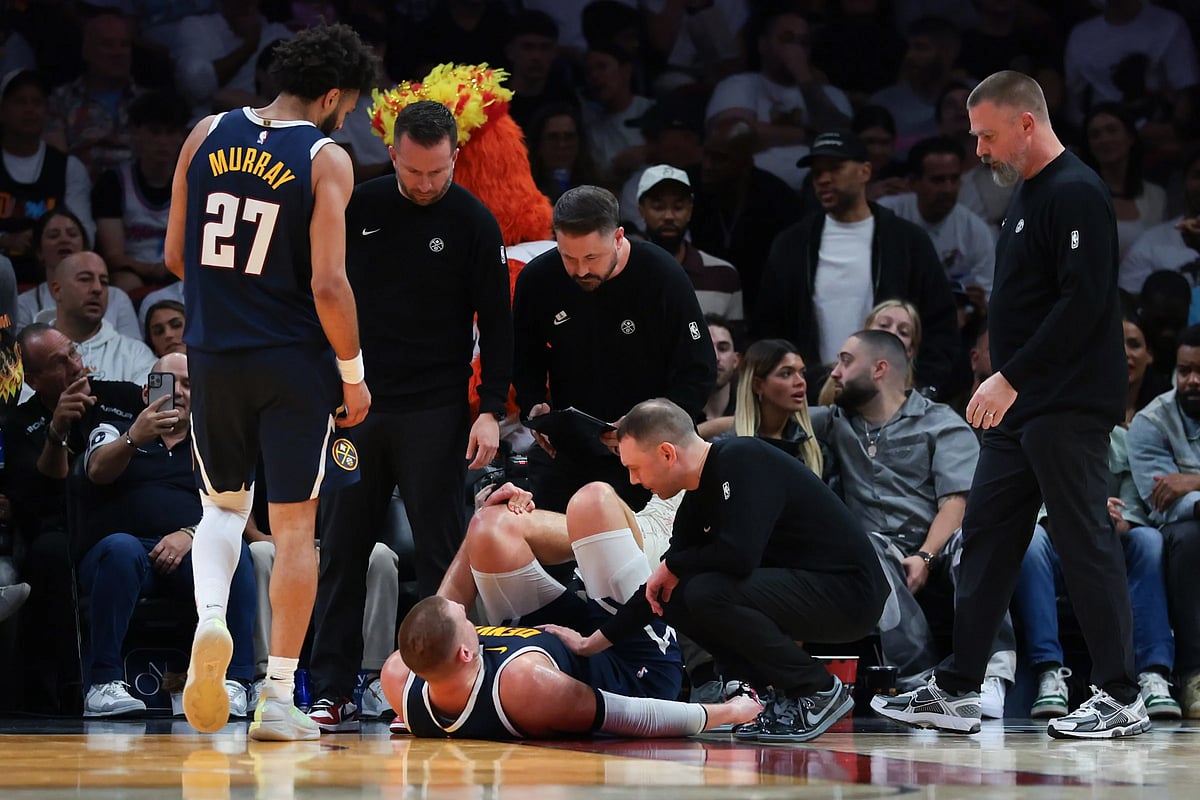 Jokic suffers 'gut-wrenching' knee injury as Nuggets thrashed